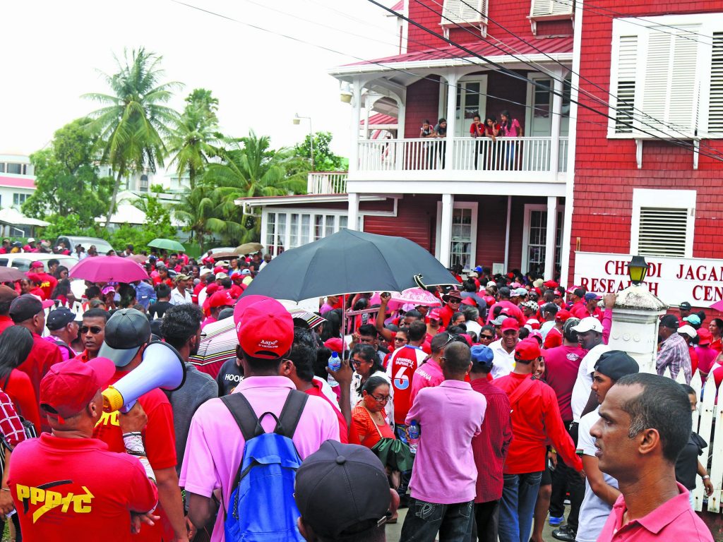 “Respect Guyana’s Constitution!” – PPP supporters to GECOM - Guyana Times