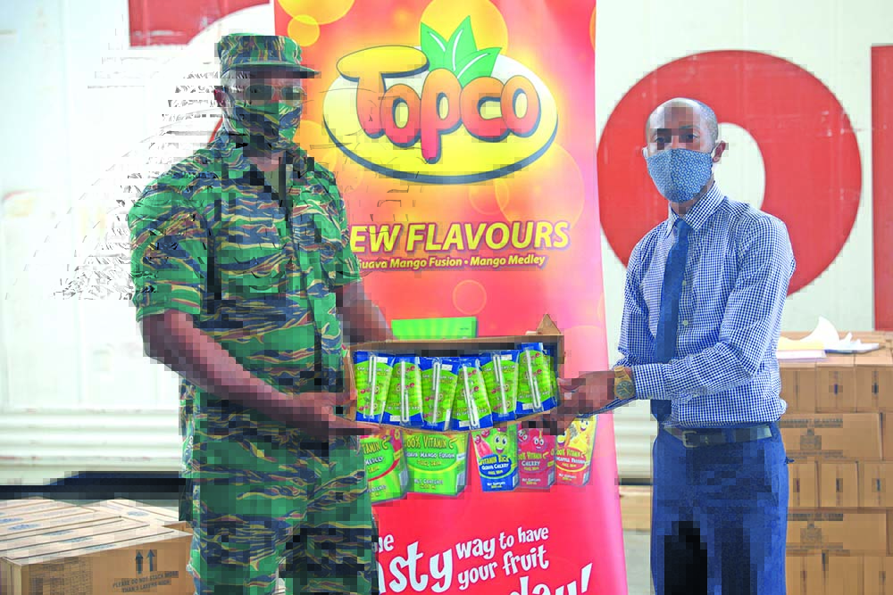 DDL donates 34,000 cases of juice to CDC, MoPH - Guyana Times