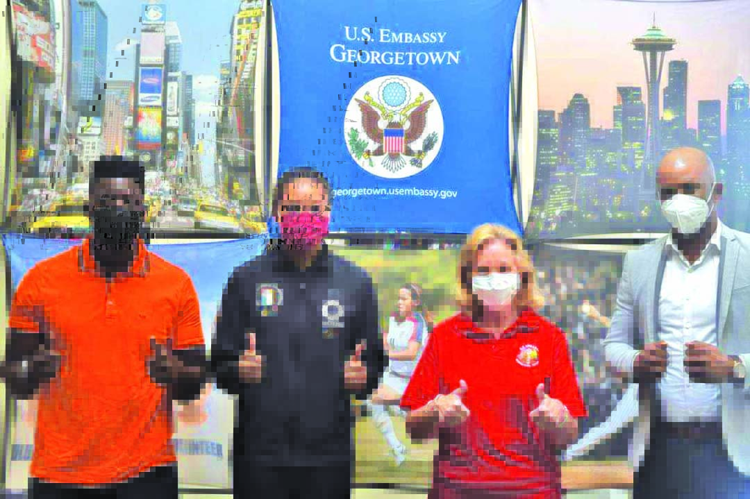 US Ambassador Sarah-Ann Lynch congratulates Olympian Chelsea Edghill ...