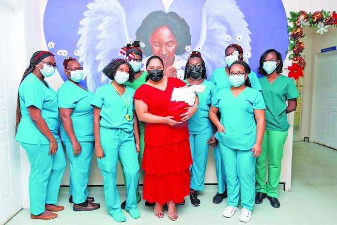 First Lady takes cheer to GPHC’s Christmas babies - Guyana Times