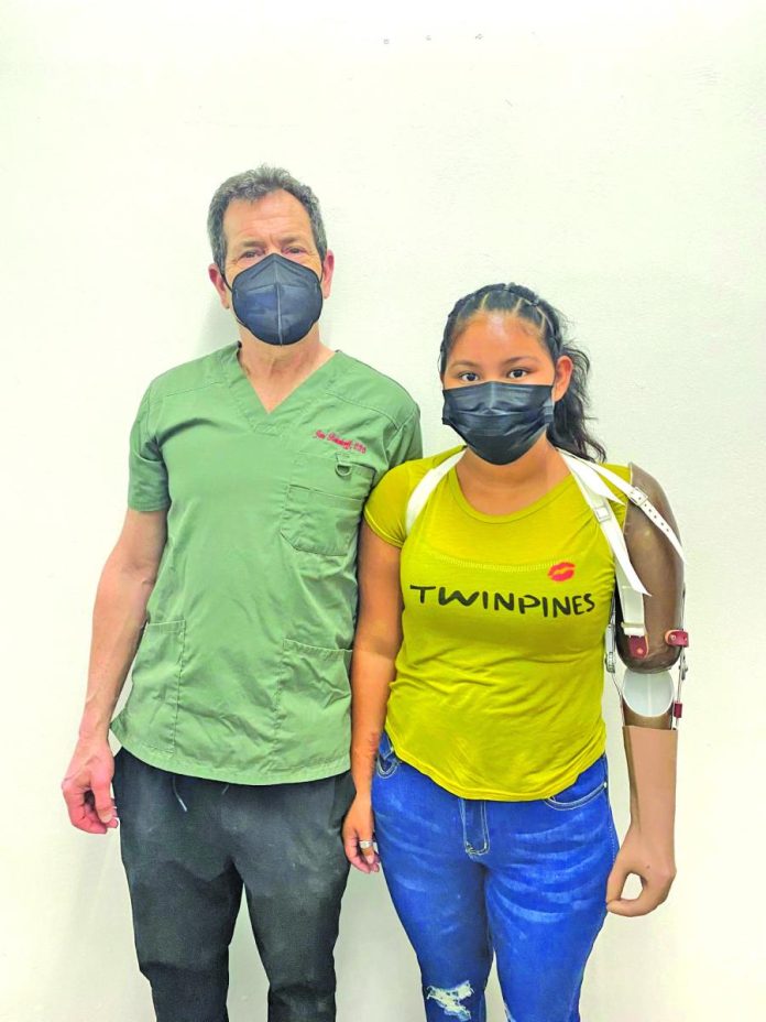 “I am getting to use my arm again” – teen adjusts to mechanical arm ...