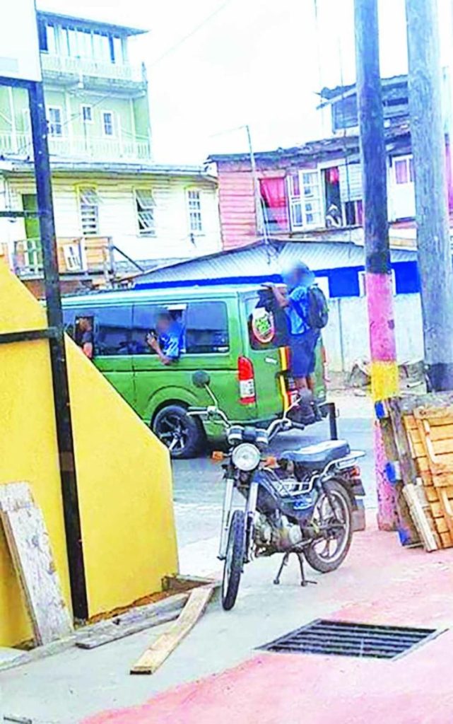 Driver arrested after teen seen hanging on to moving, overloaded ...