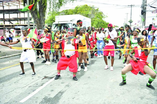 Guyanese revel in heavy downpours to celebrate Mashramani - Guyana Times