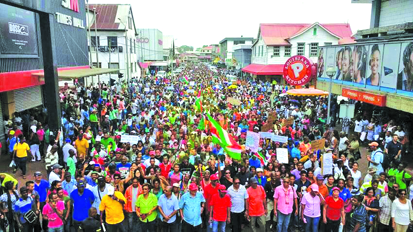 Caricom throws support behind Santokhi as violent protests shake ...