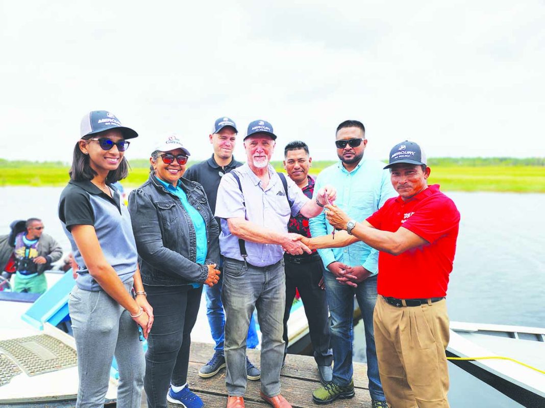 Farmsup donates boat, outboard engine to Akawini village - Guyana Times