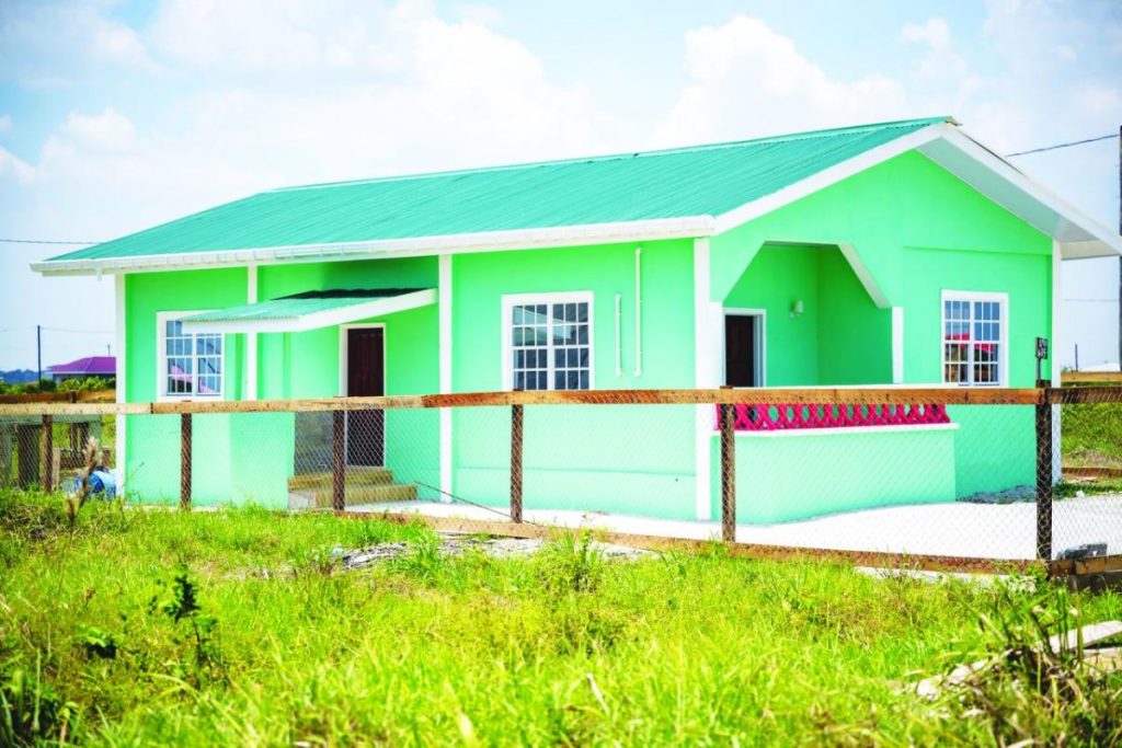 Mohamed family hands over 2 new houses to amputee, caretaker - Guyana Times