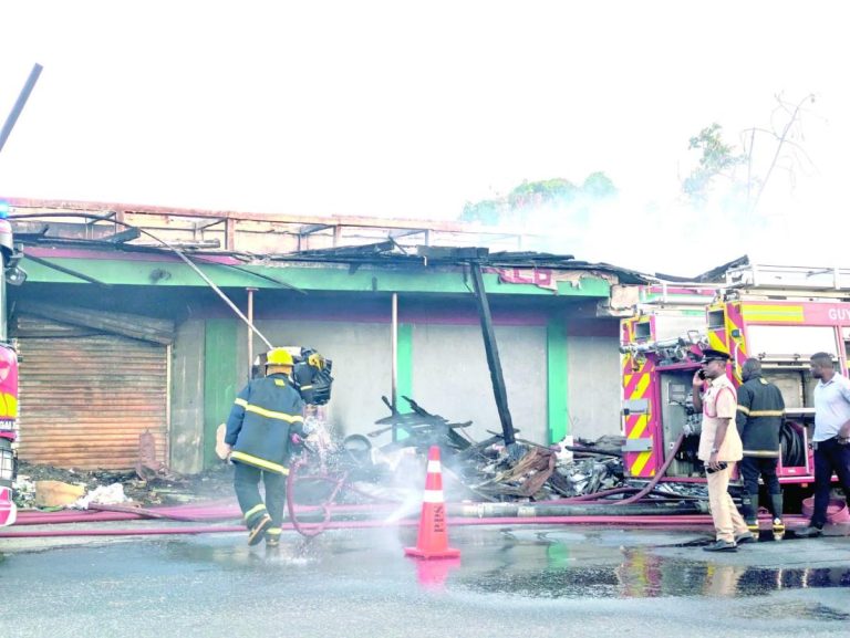 Fire reignites at burnt remains of Saffon Street supermarket - Guyana Times