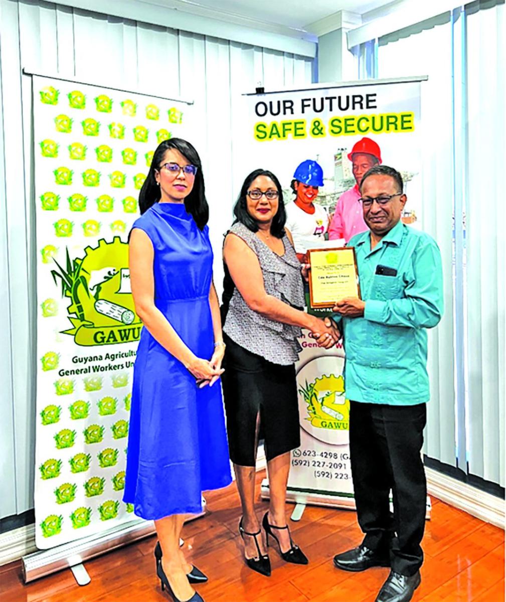 GAWU confers posthumous award to late Ashton Chase - Guyana Times