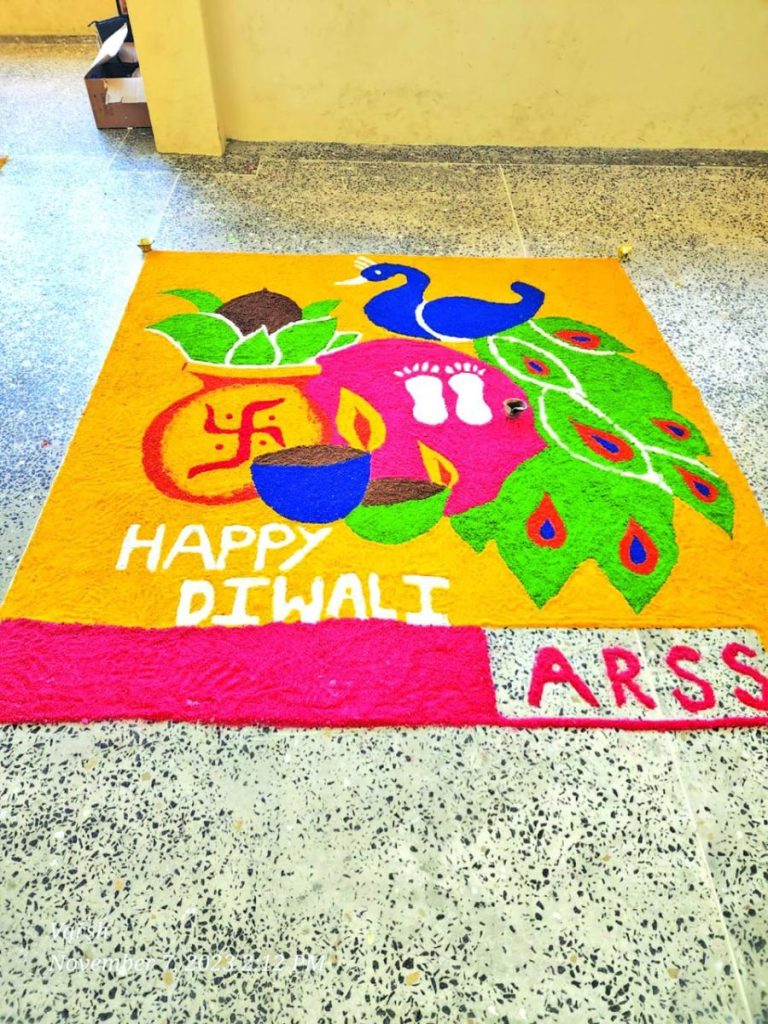 Aurora Secondary School students with their winning trophy and rangoli ...