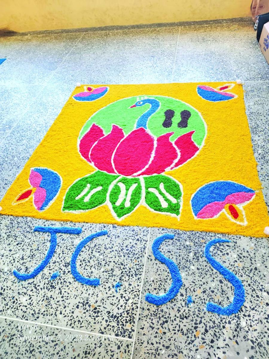 Aurora Secondary School students with their winning trophy and rangoli ...