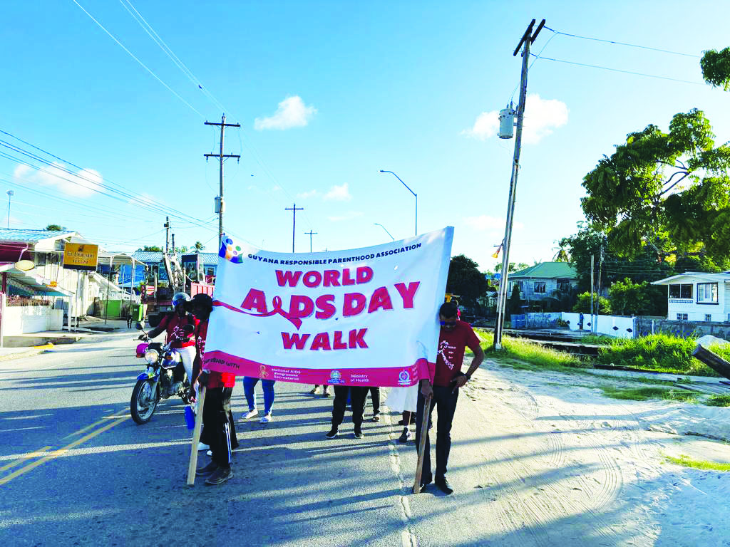 GRPA, NAPS host World AIDS Day walk, candlelight vigil - Guyana Times