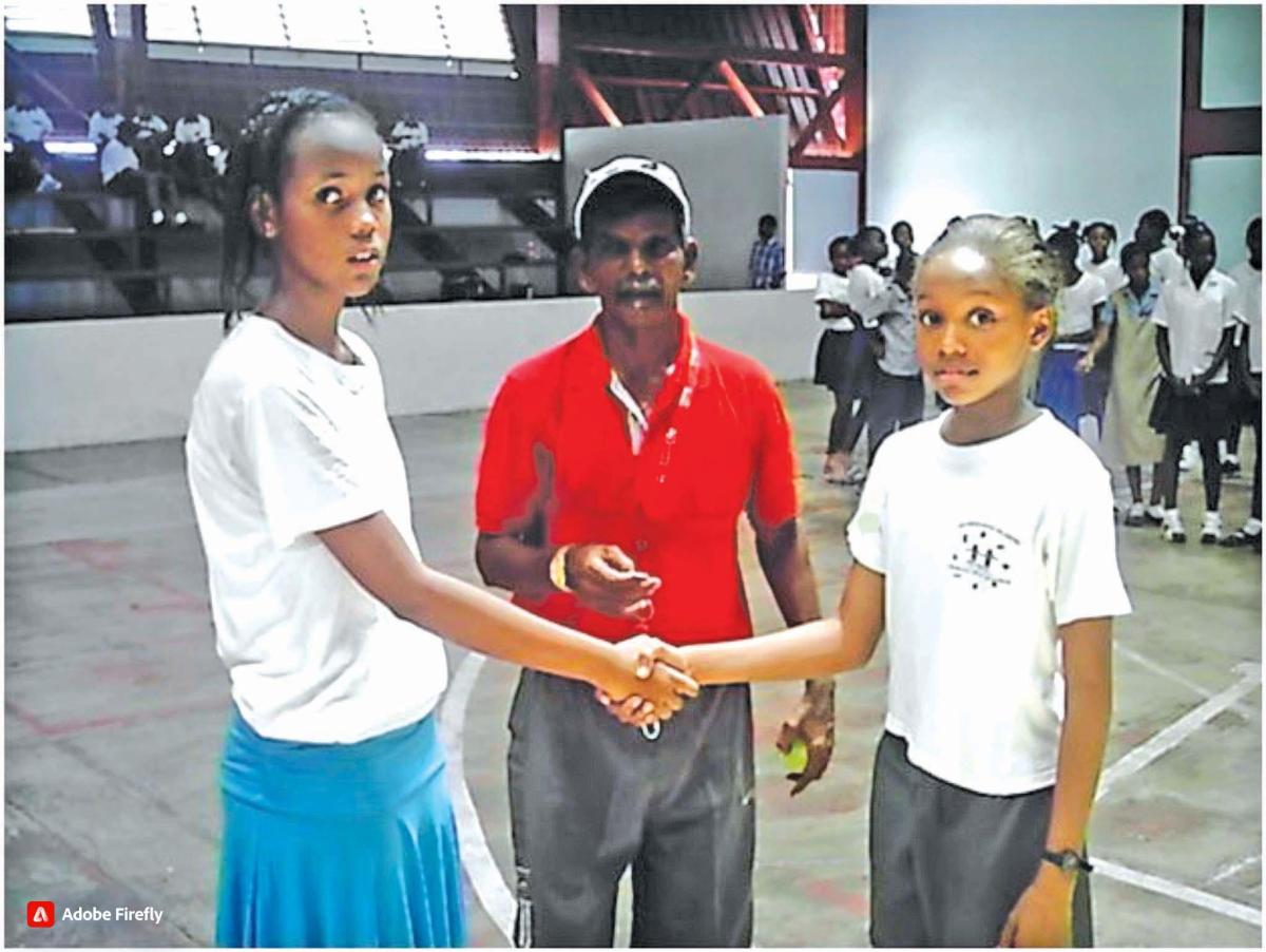 Olympian Edghill interacts with junior female windball players - Guyana ...