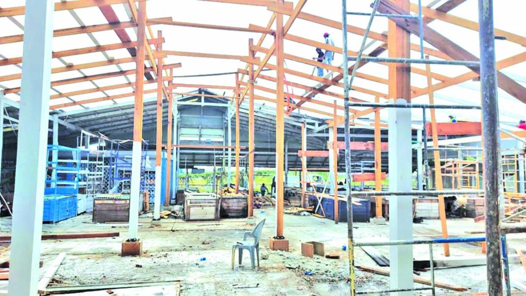 6 months after fire: Work to rebuild roof at Corriverton Market ...