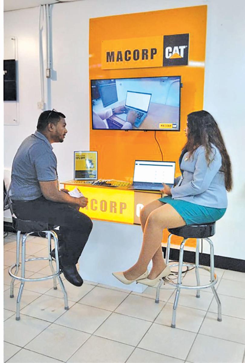 MACORP launches sign-up booth to support online shopping experience - Guyana Times