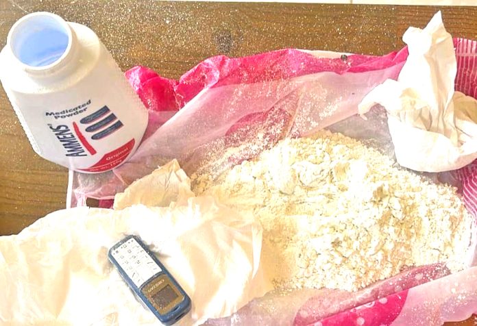 Man caught attempting to smuggle phone in powder bottle into Timehri ...