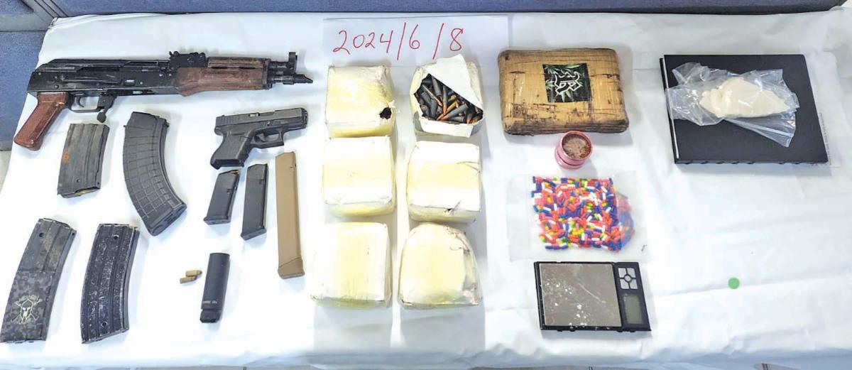 Kitty man busted with AK-47, gun silencer, ammo, drugs - Guyana Times
