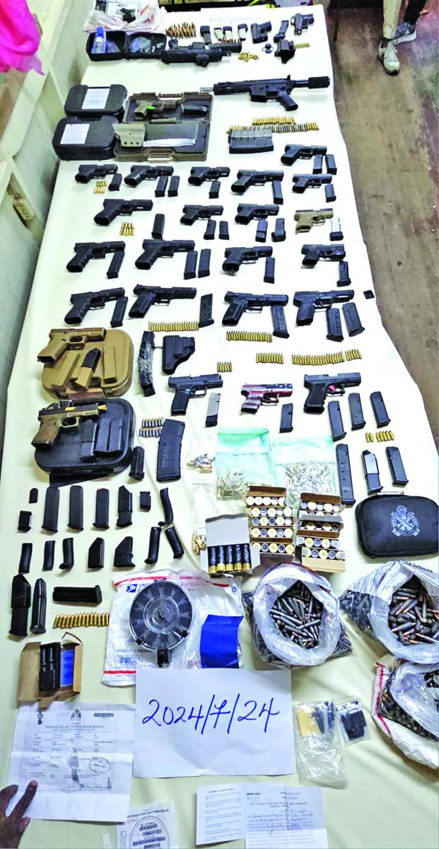 26 high-powered rifles & handguns, over 1600 bullets found during ...
